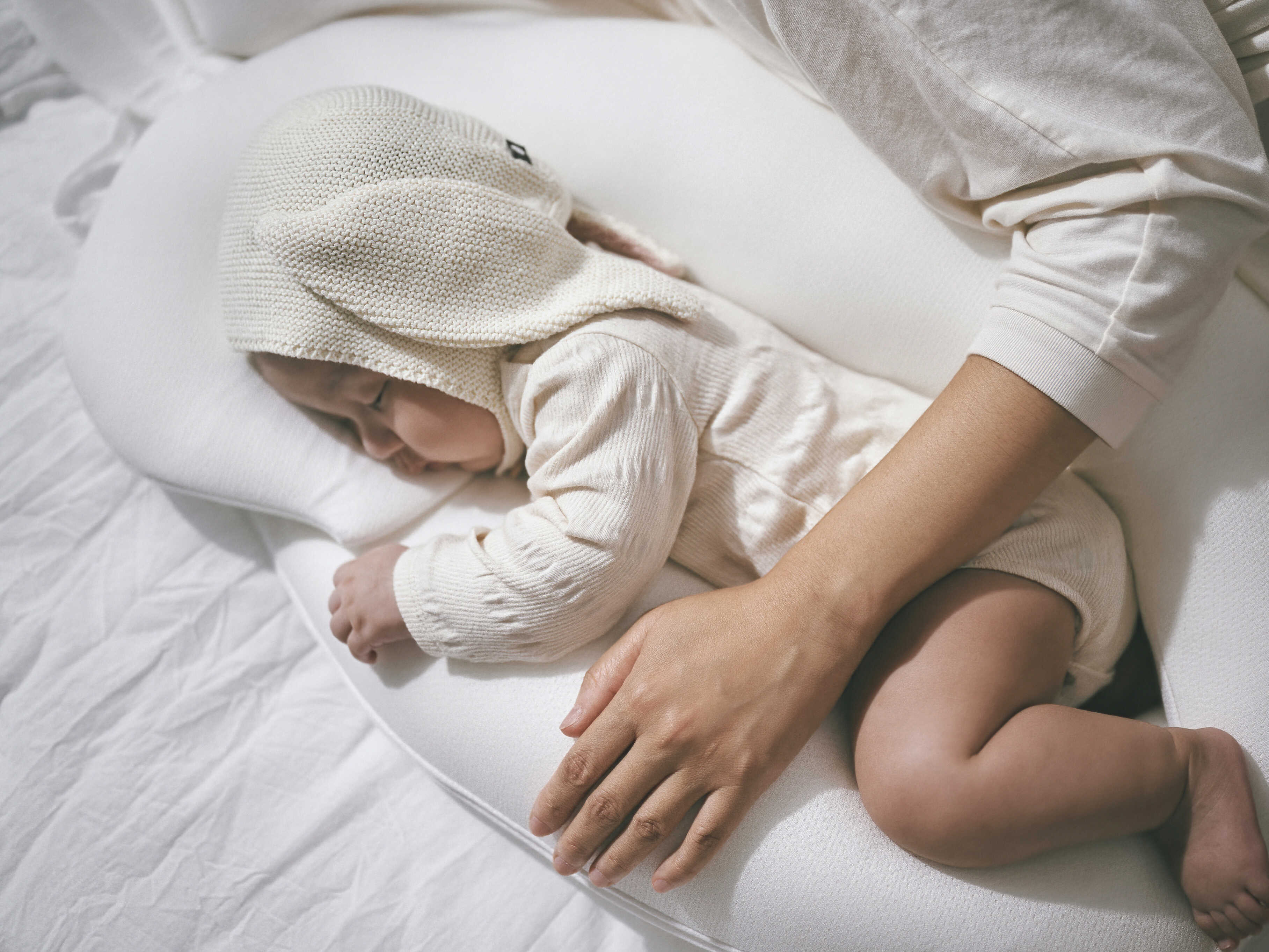 iF Design - Head-to-the-side baby positioning pillow