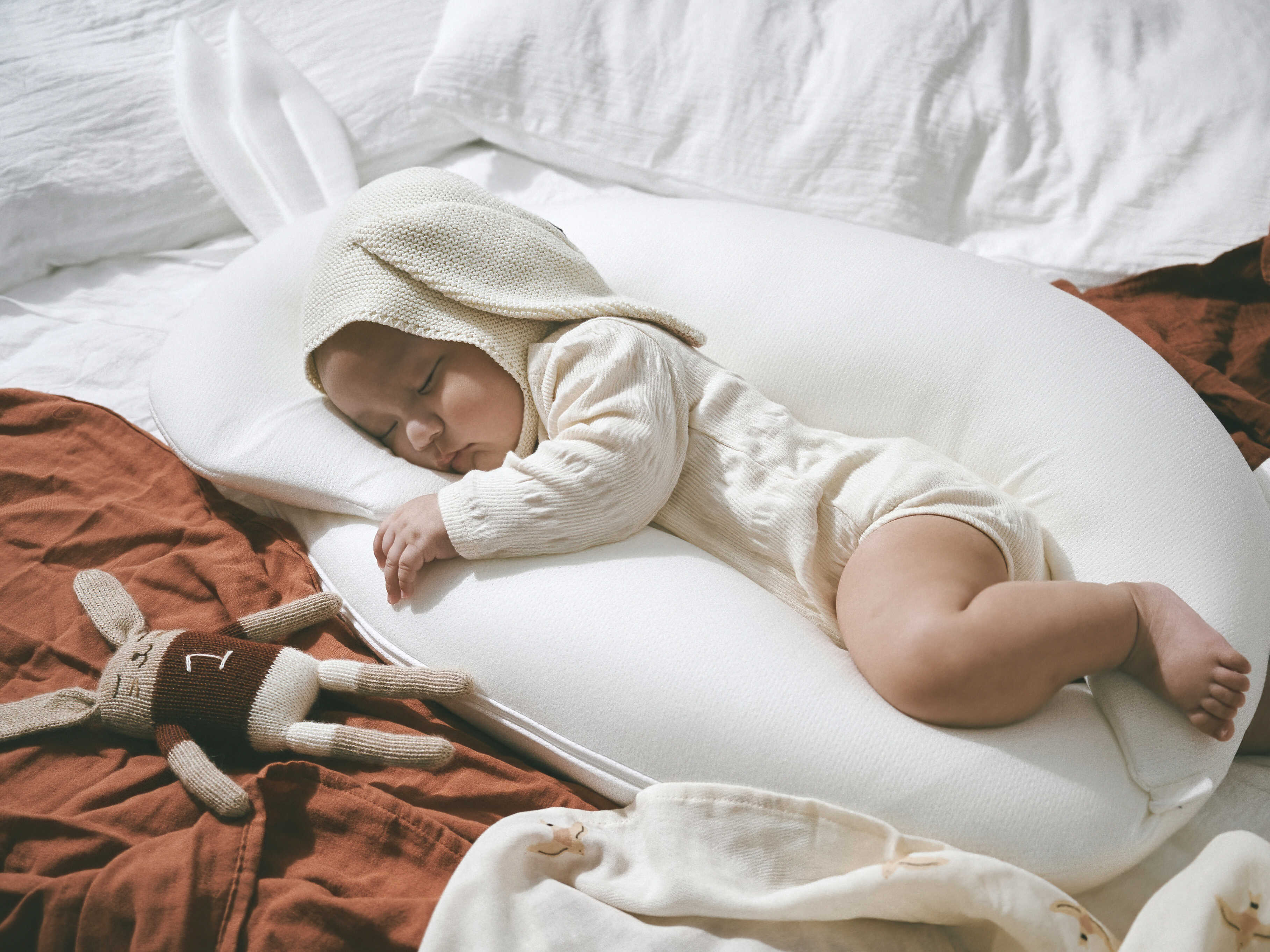 iF Design - Head-to-the-side baby positioning pillow